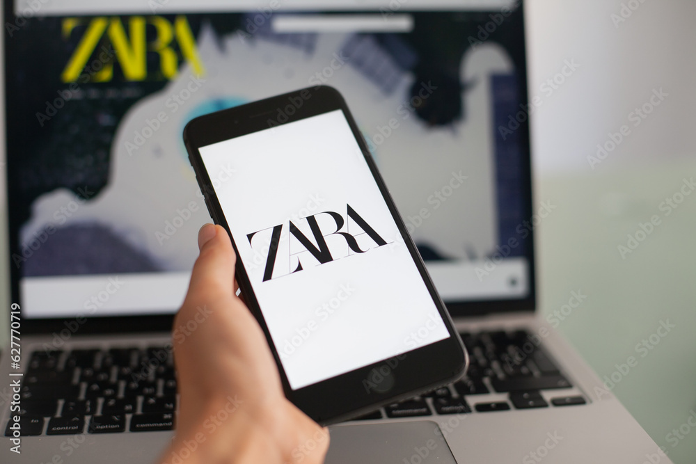 Zara logo on the screen of mobile phone. Inditex group brand identity ...