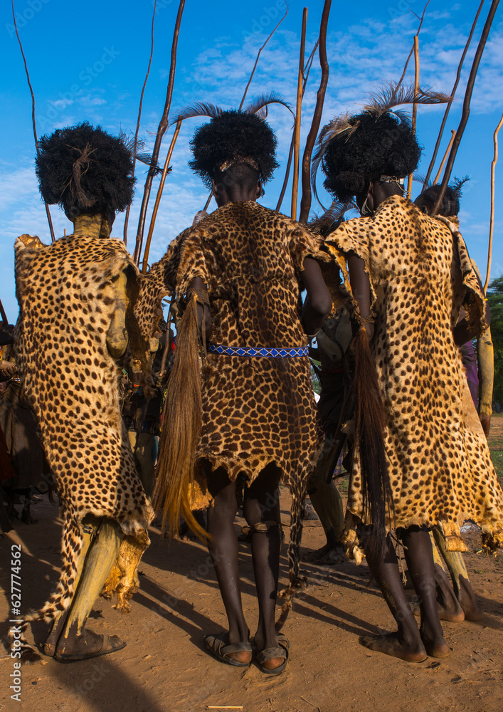 Dassanech men with leopard skins and ostrich feathers headwears during ...