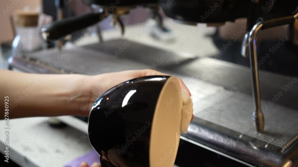 Blowing the steam tube of the coffee maker. Disinfection of dishes with ...