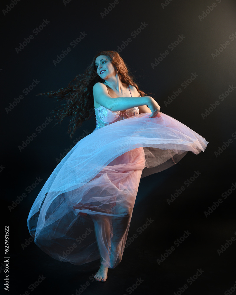 Full length portrait of beautiful brunette woman dancer, wearing ...