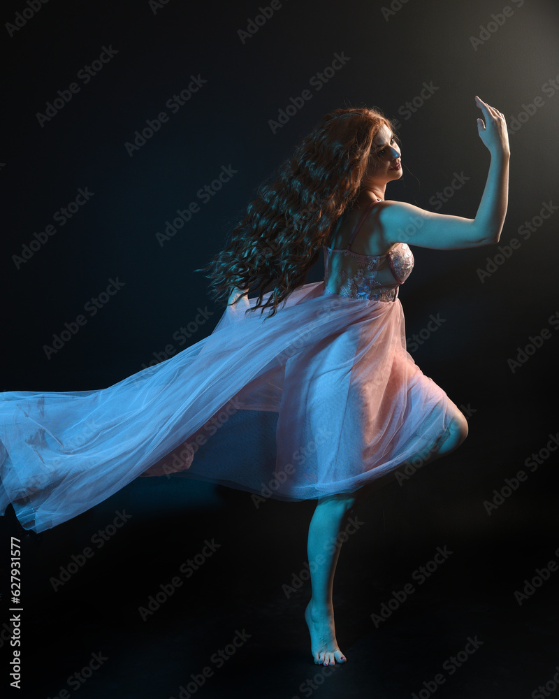 Full length portrait of beautiful brunette woman dancer, wearing ...