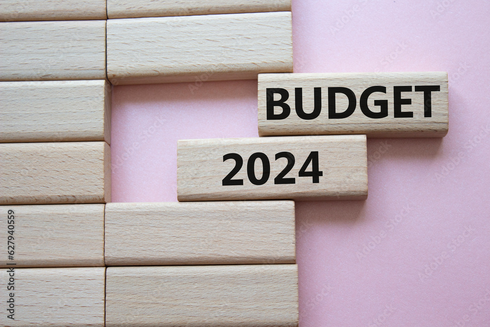 Budget 2024 symbol. Wooden blocks with words Budget 2024. Beautiful ...