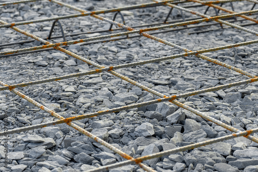 Welded wire mesh, WWM, installed within a sidewalk concrete form prior ...