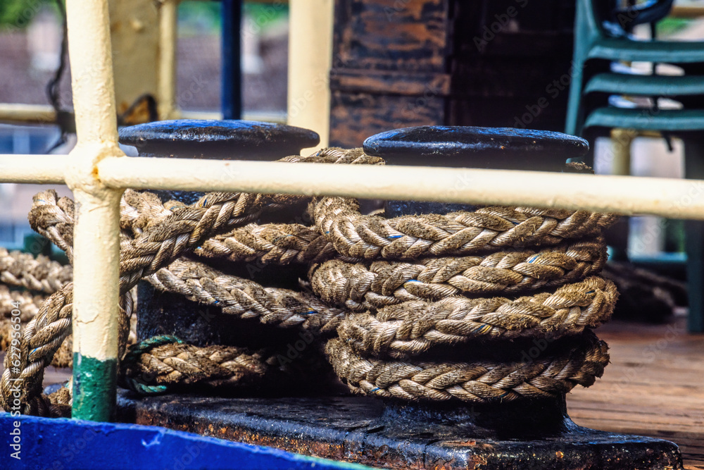 Mooring hawser on a bollard at the boat deck Stock Photo | Adobe Stock