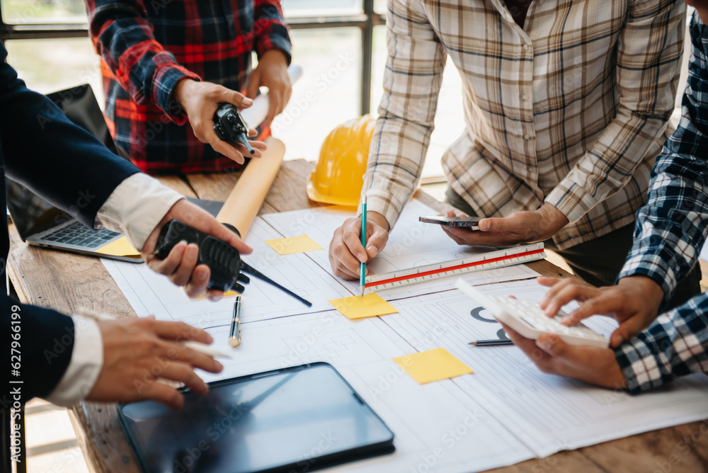 Engineer teams meeting working together wear worker helmets hardhat on ...