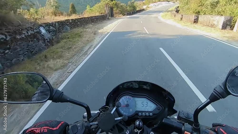 motorcycle rider view of different mountain curvy road landscape at day ...