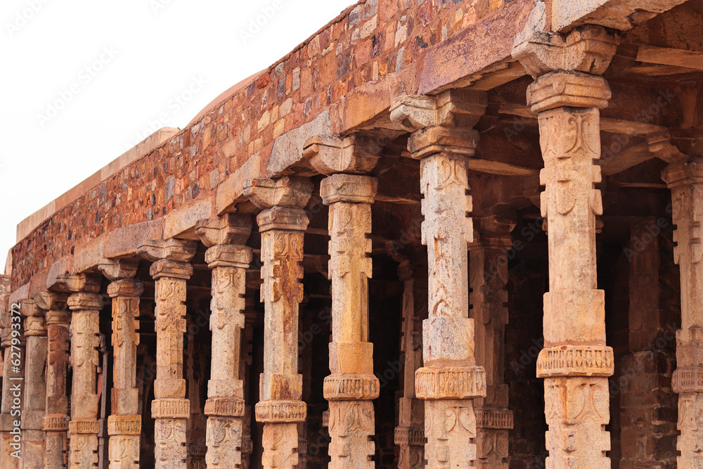 Ancient pillars with an infinite viewer near the Qutub Minar Columns ...