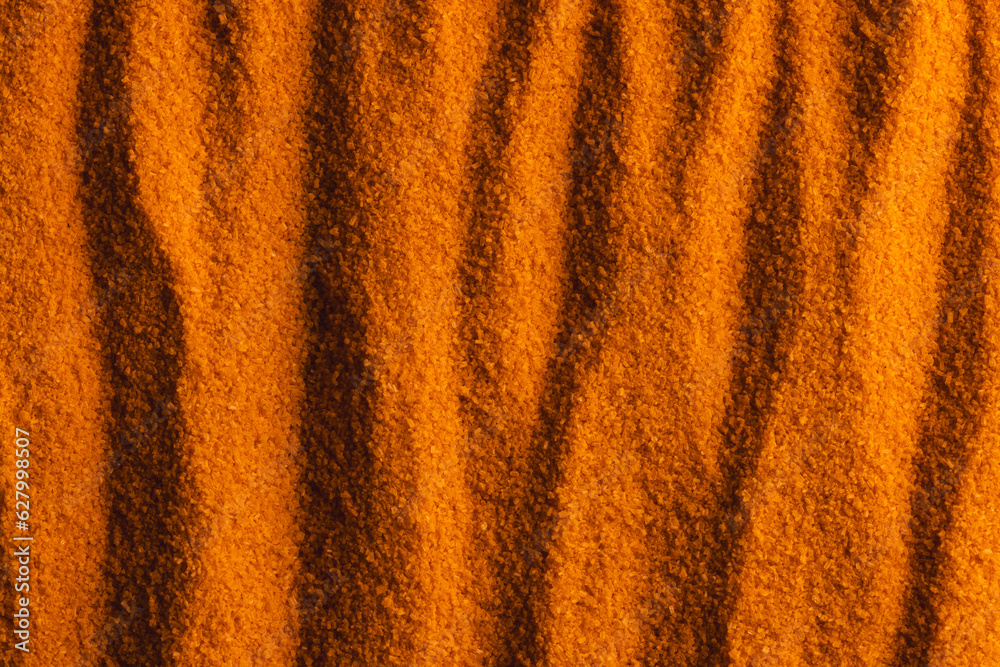 Close up of pattern of orange sand and copy space background Stock ...