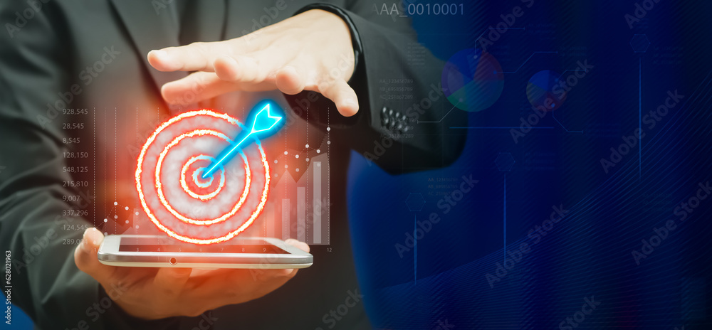 Businessman shows fire target icon. Finding or analyzing business goals ...