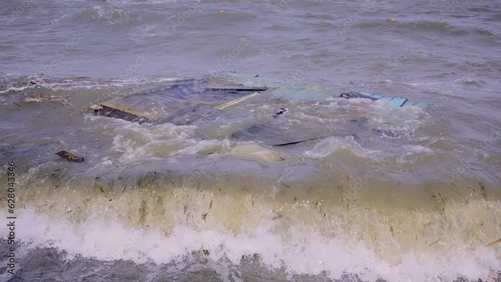 Part of wall of house floats near shore, floating debris has reached ...