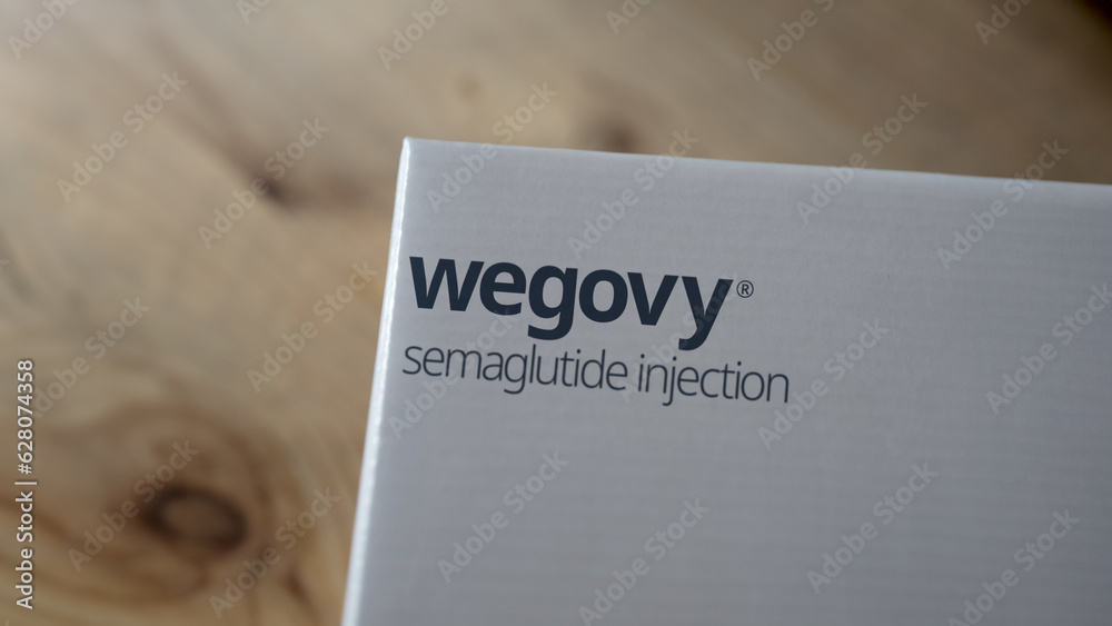 The logo of wegovy semaglutide injection on a box. Wegovy injector pens ...