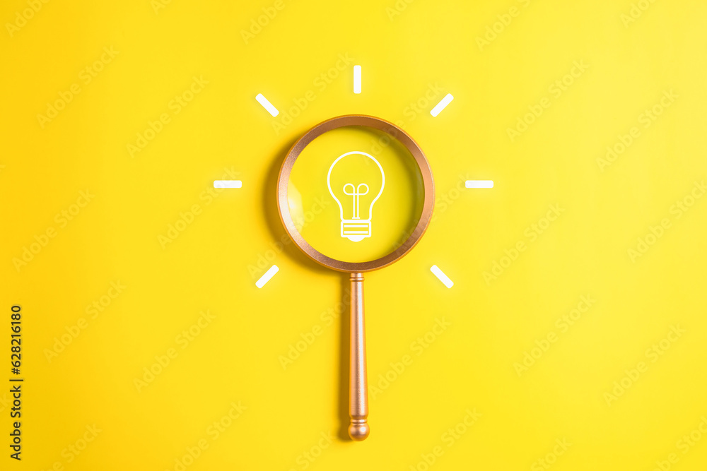 Light bulb icon with magnifying glass for creative idea thinking ...