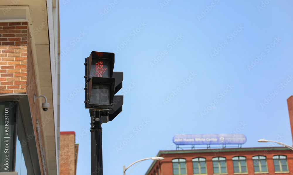 pedestrian traffic walking sign depicts city life, safety, and ...