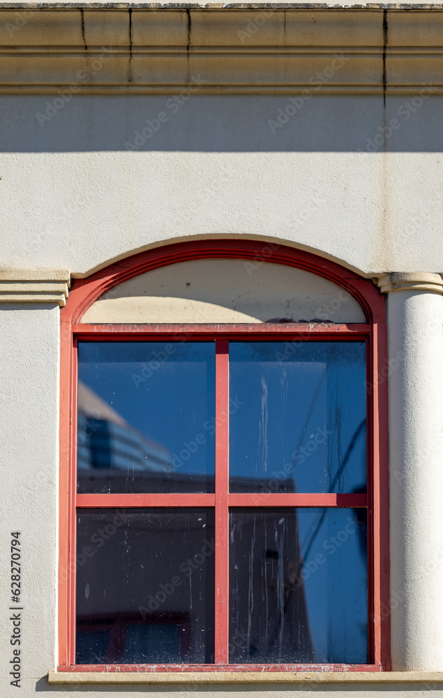 Arched Window with Four Panes of Glass and a Red Wooden Sash. Stock ...