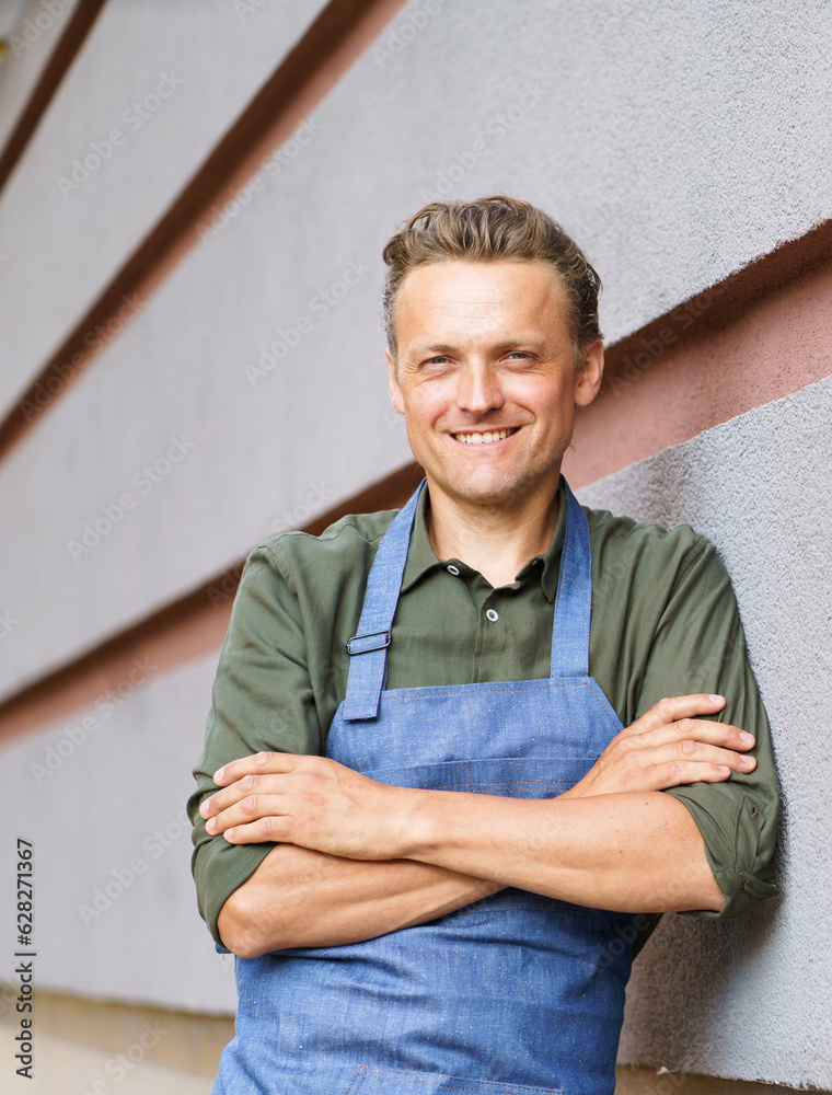 Skilled and dedicated waiter or service man in restaurant setting ...