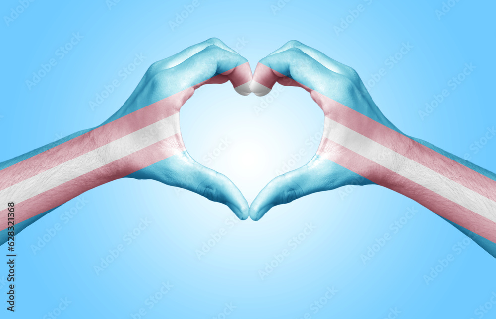 Transgender flag, transgender flag pattern painted heart shaped hands ...