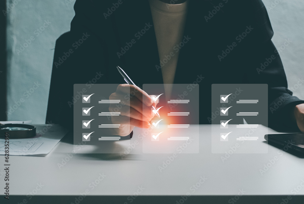 Business performance checklist, businessman using laptop doing online ...