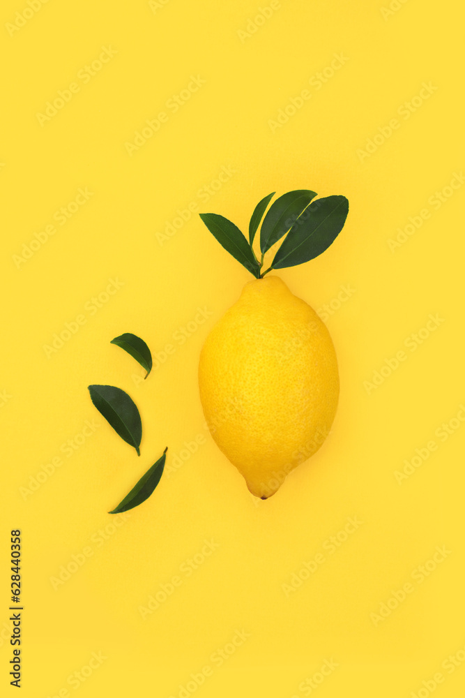 Lemon citrus fruit health food abstract design with leaves on yellow ...