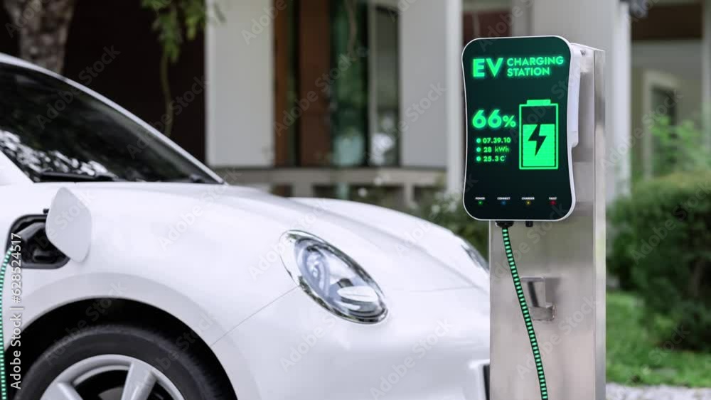 Electric car recharging from home charging station by futuristic EV ...