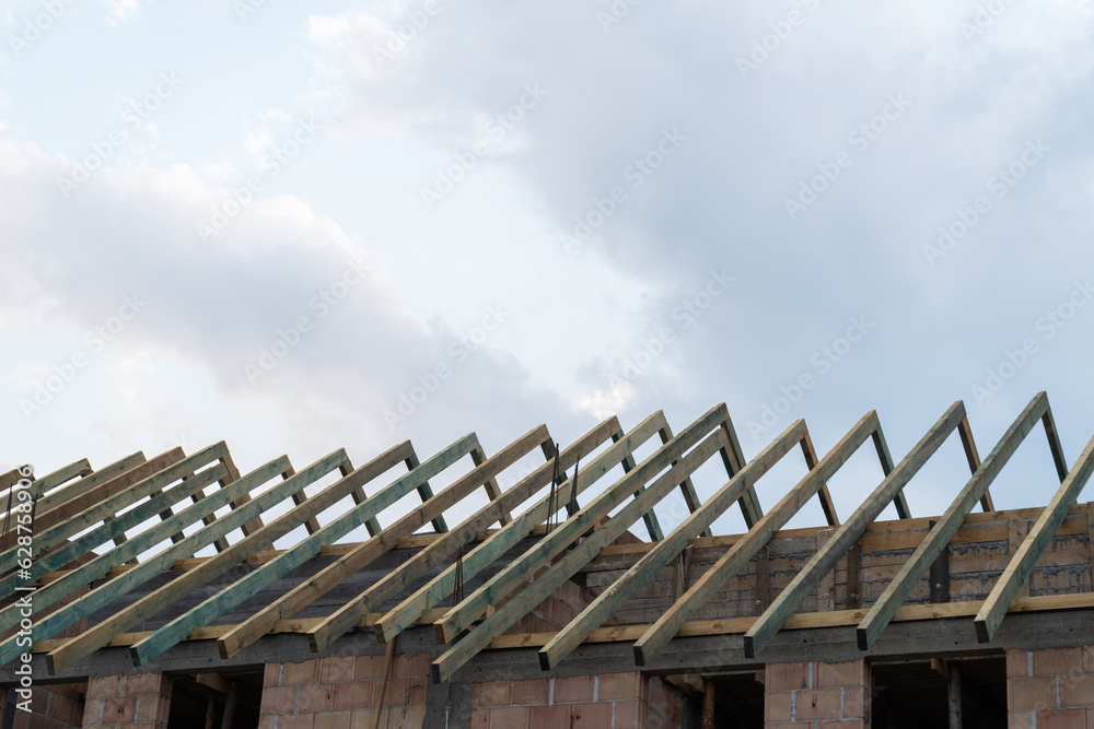 Residential construction site of terraced house or row homes. Roof ...