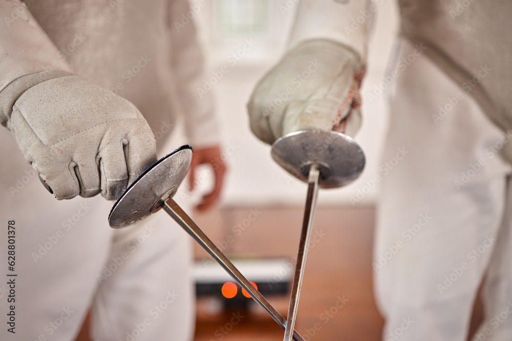 Fencing, hands or fight with a sword in training, exercise or fighting ...