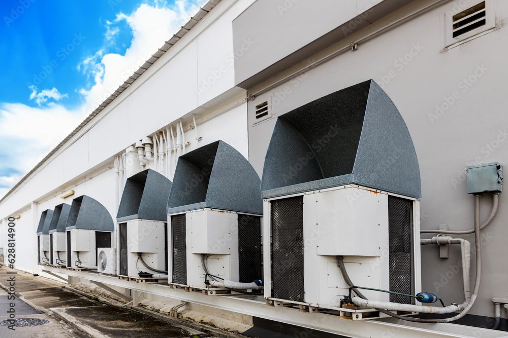 Air conditioner compressor installed in old building. Outdoor split ...