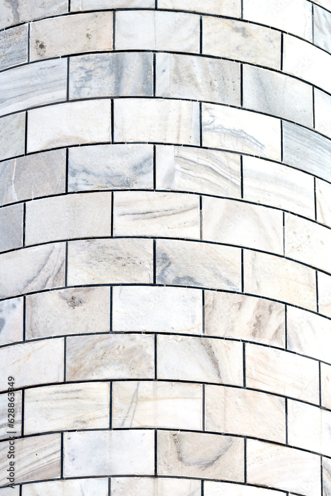 White marble bricks of Taj Mahal minaret towers, close up ivory white ...
