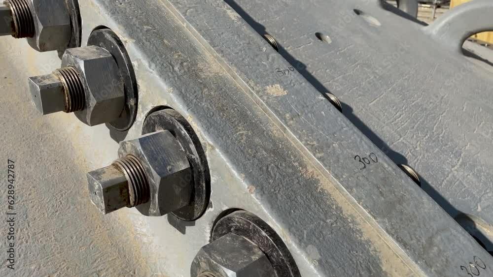 Bolted connection of parts of a ball mill close up. Copper processing ...