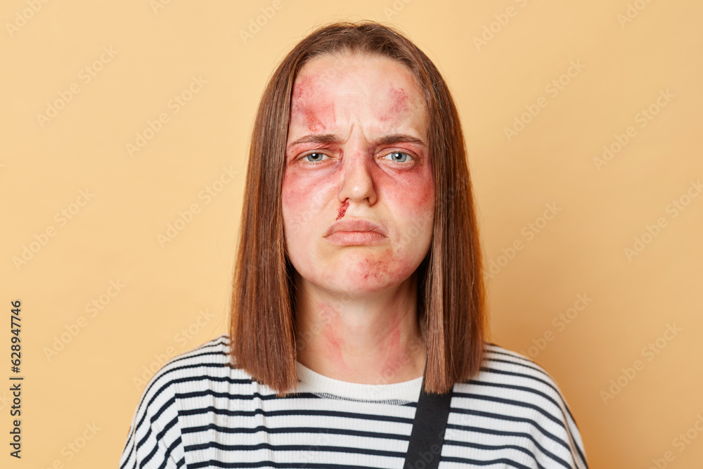 Strong woman overcoming trauma. Empowering victims of violence. Unhappy ...