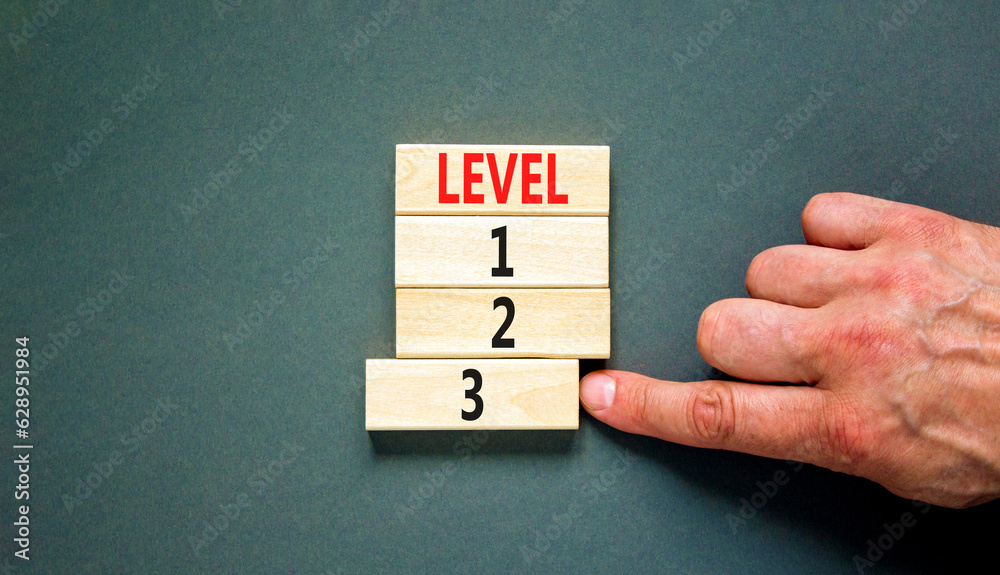 Time to level 3 symbol. Concept word Level 1 2 3 on wooden block ...