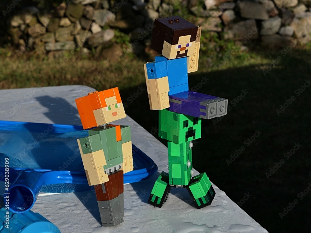 LEGO Minecraft figure of Steve riding on head of explosive green ...