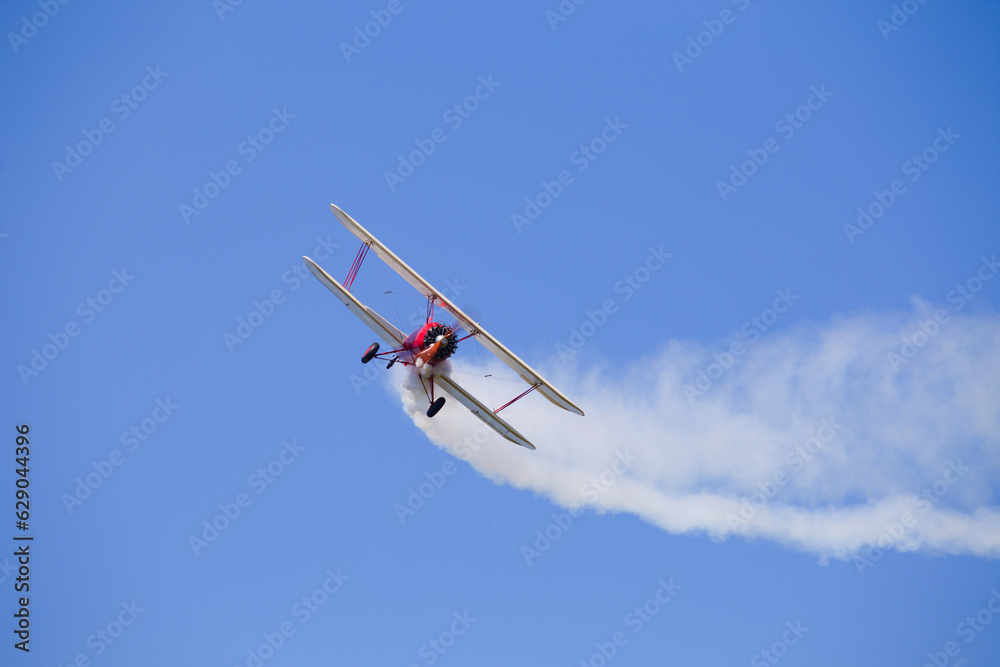 Poster A red biplane Hatz Classic with white wings and radial engine ...