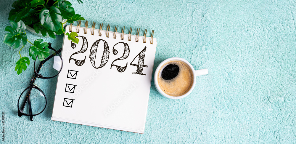 New year resolutions 2024 on desk. 2024 resolutions list with notebook ... New year resolutions 2024 on desk. 2024 resolutions list with notebook ...