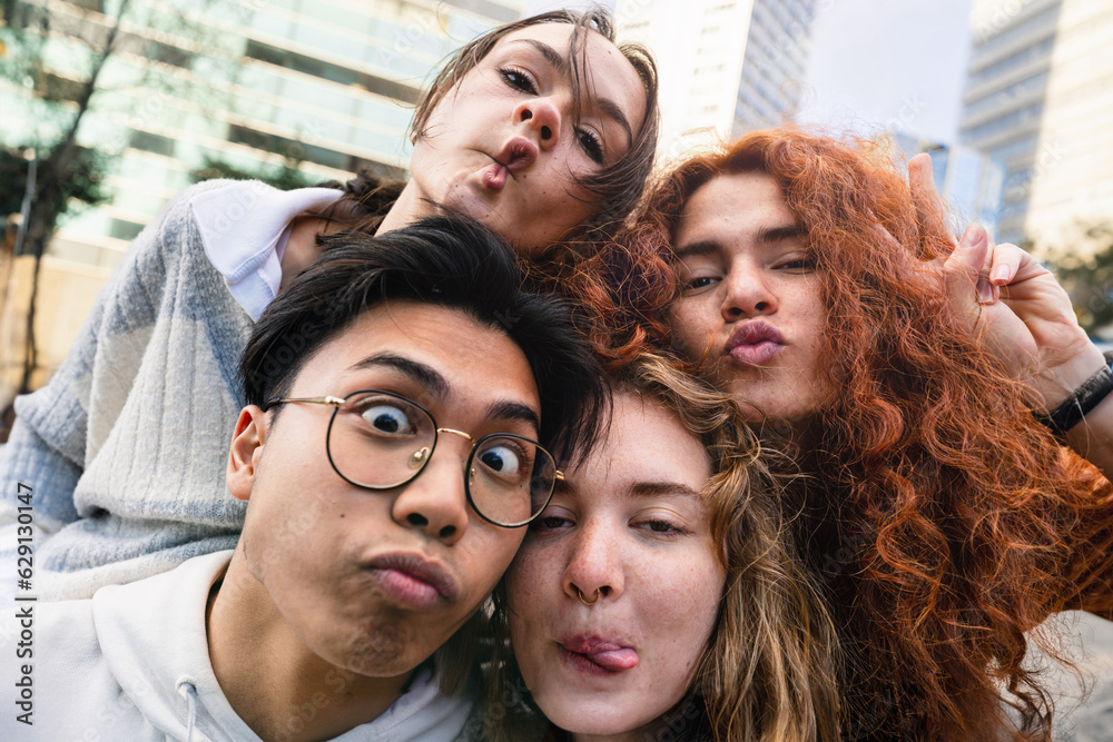 Young friends fooling and making funny faces. Crazy generation z youth ...