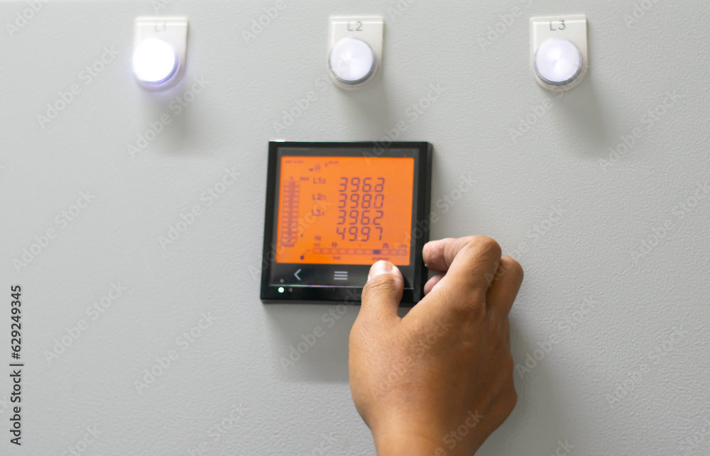 Electrician work tester measuring voltage and current of power electric ...