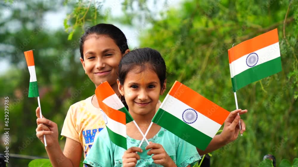 Happy Indian kids holding Indian National flag. Indian Kids celebrating ...