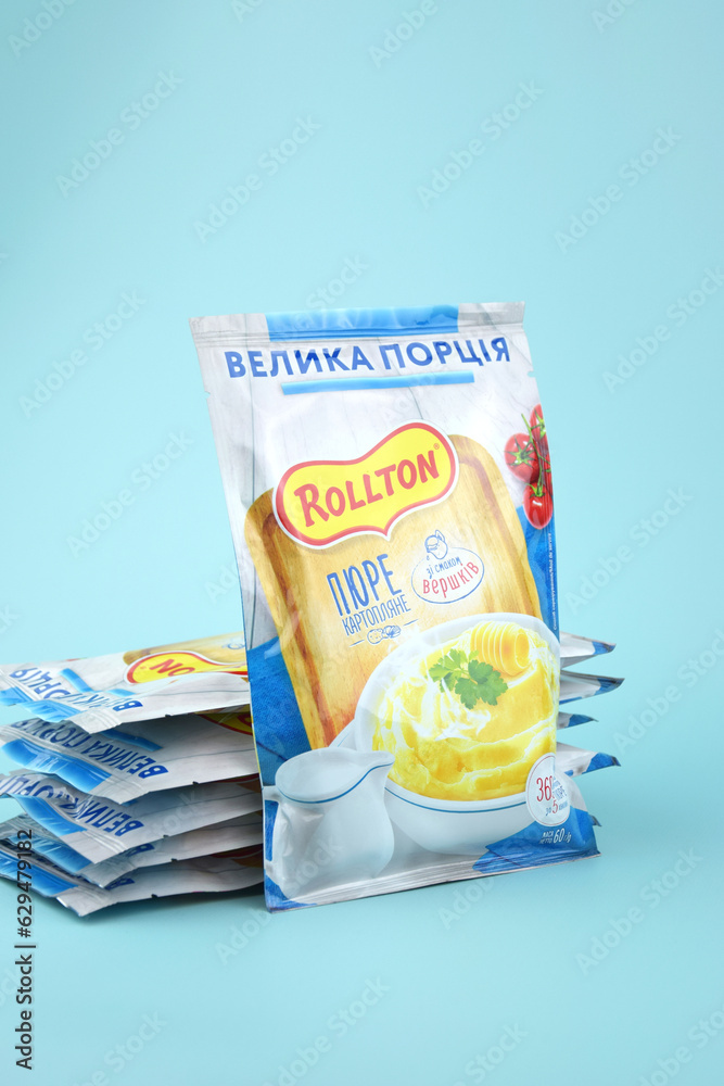 Rollton instant mashed potatoes on a blue background. Fast food, junk ...