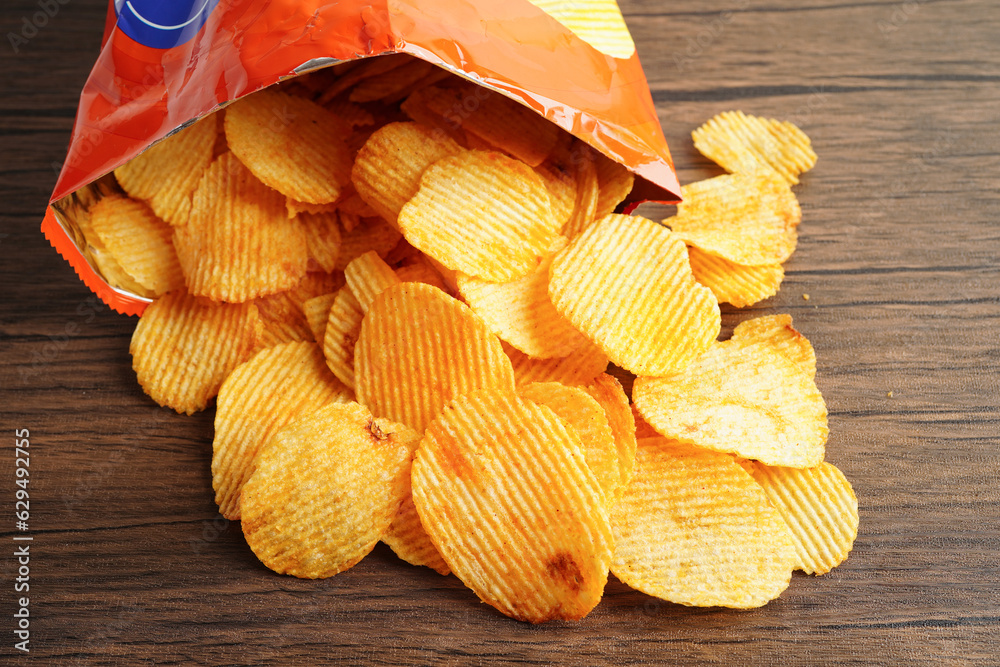 Potato chips in open bag, delicious BBQ seasoning spicy for crips, thin ...
