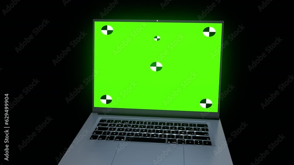 Modern laptop 3d render against black background with green screen ...