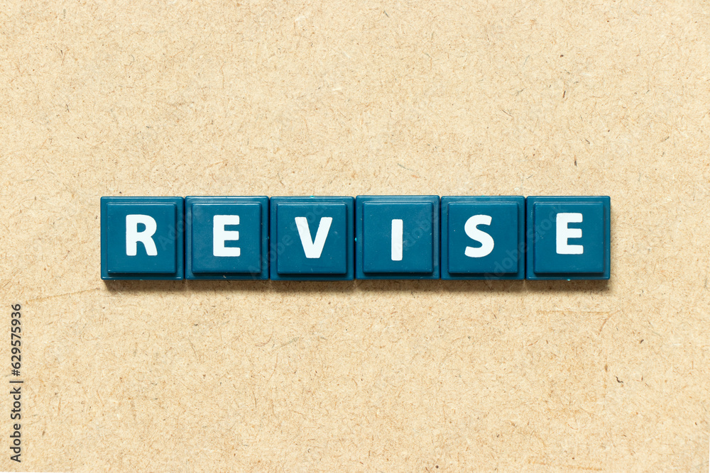 Tile alphabet letter in word revise on wood background Stock Photo ...