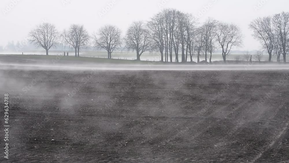 The frost comes out of the ground in the springtime in the landscape in ...