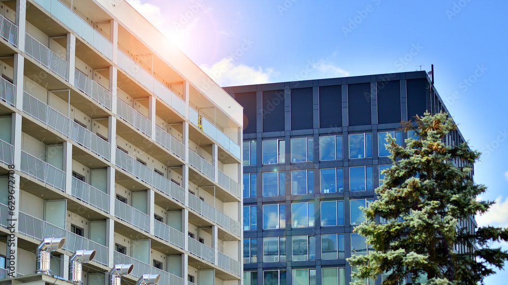 Modern residential building with new apartments in a green residential ...