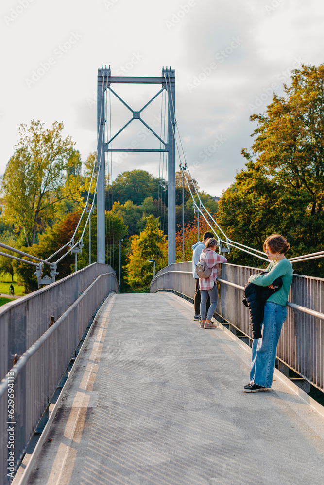 Sad teenager girl depressed standing in the floor of a bridge on the ...