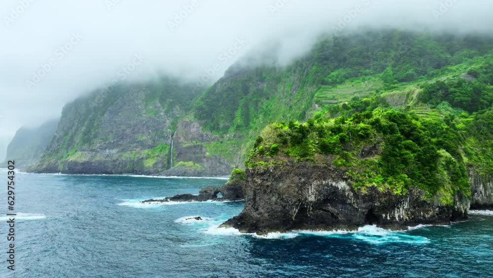 Scenic coast, Waves crash on the cliff shore, Untouched nature on sunny ...