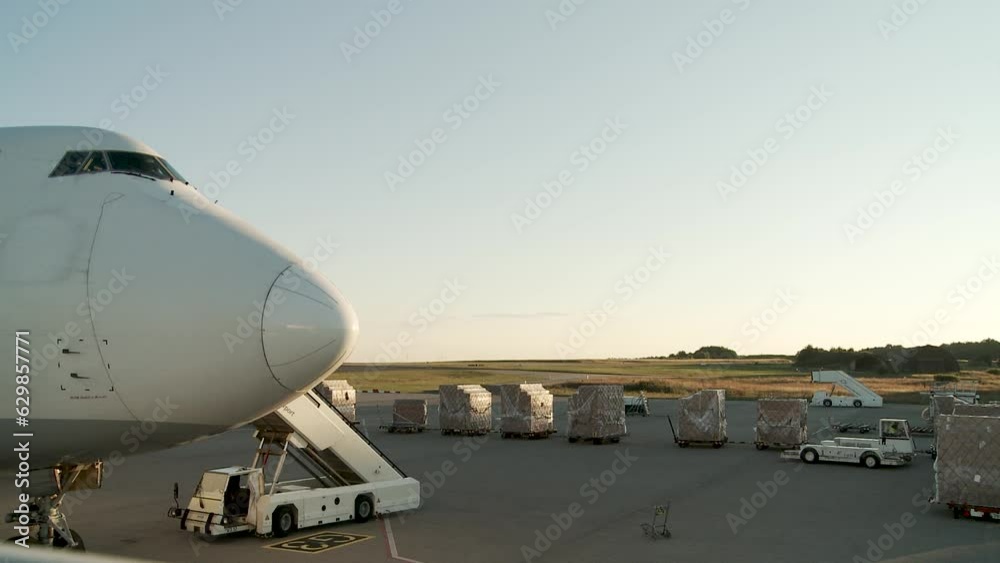 This image showcases a large white Boeing 747 airplane, characterized ...