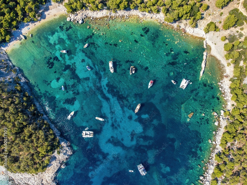 Aerial photo of boats moored at beautiful Velo Borce beach on Hvar ...