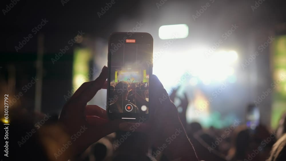 Music fan man film concert show with smart phones chroma key green ...