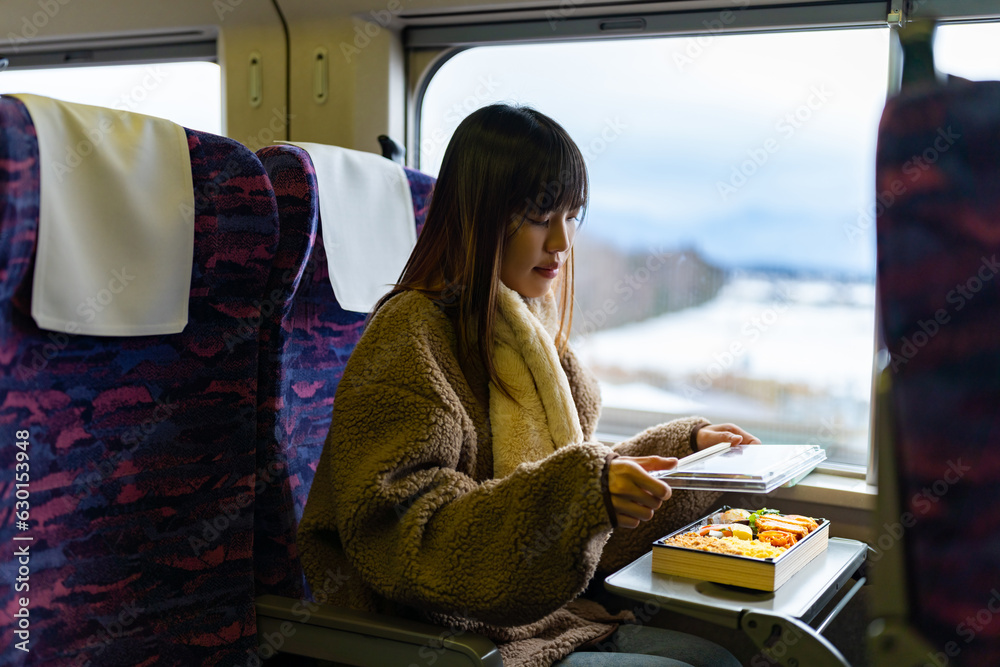 Asian woman eating traditional Japanese pork cutlet with rice Tonkatsu ...