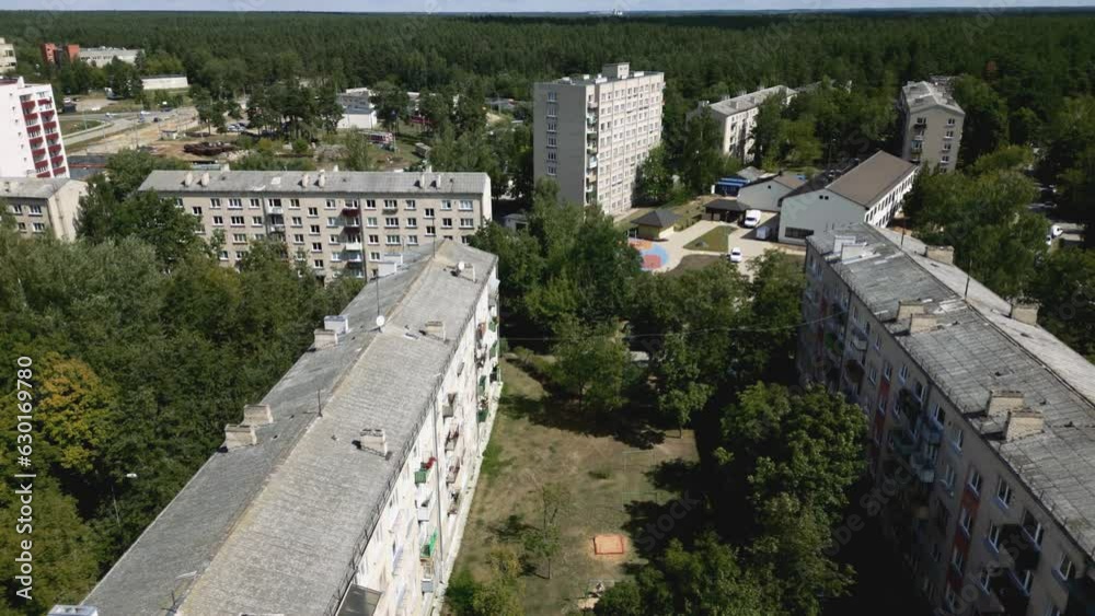 Lowering drone residential Soviet area revealing Khruschevka apartments ...