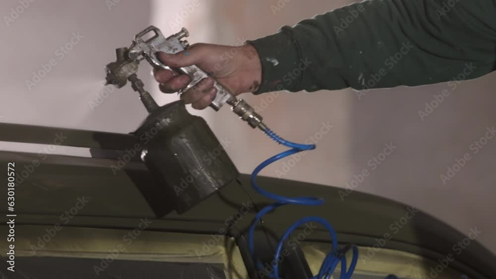 Mask preparation, Mask procedures, Mask safety. With spray gun, man in ...